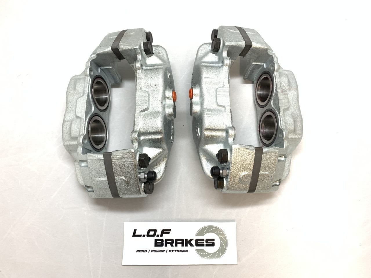 DEFENDER FRONT VENTED CALIPERS (PAIR) Stainless Pistons - LOF Clutches